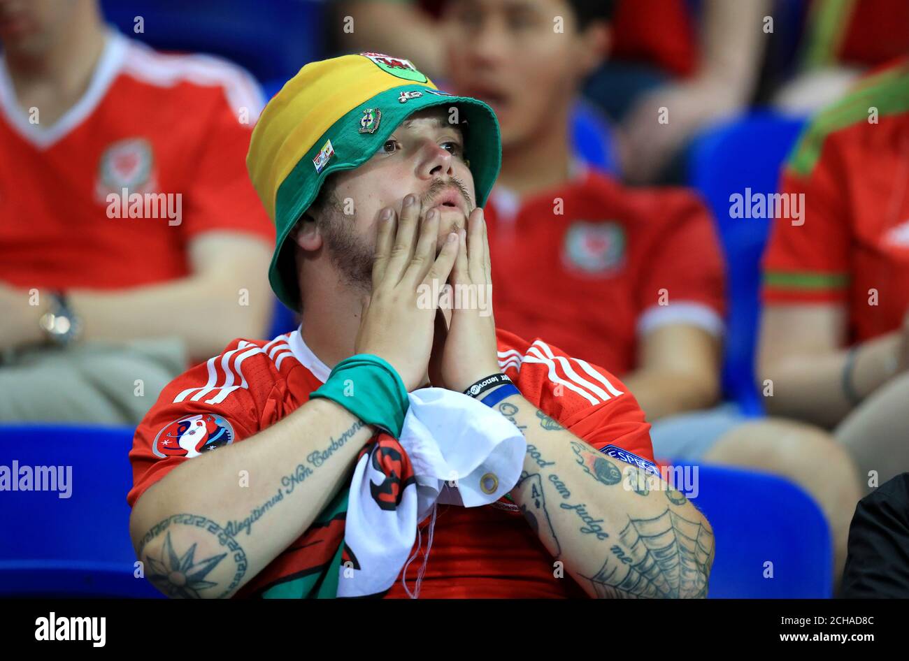 A Wales fan looks dejected in the stands following the UEFA Euro 2016 ...