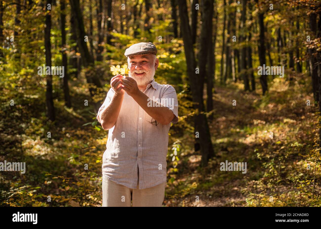 Natural beauty. Elderly man walk on natural landscape. Happy pensioner ...