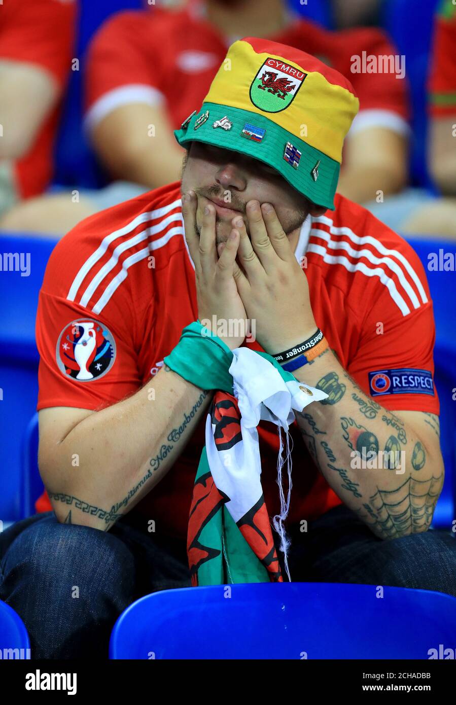 A Wales fan looks dejected in the stands following the UEFA Euro 2016 ...