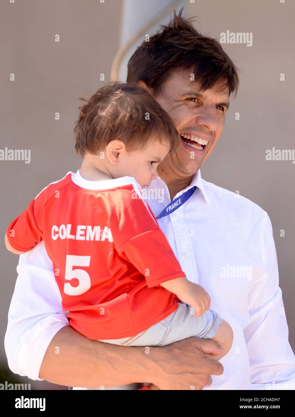 Wales manager Chris Coleman with his son Finley arriving back at the ...