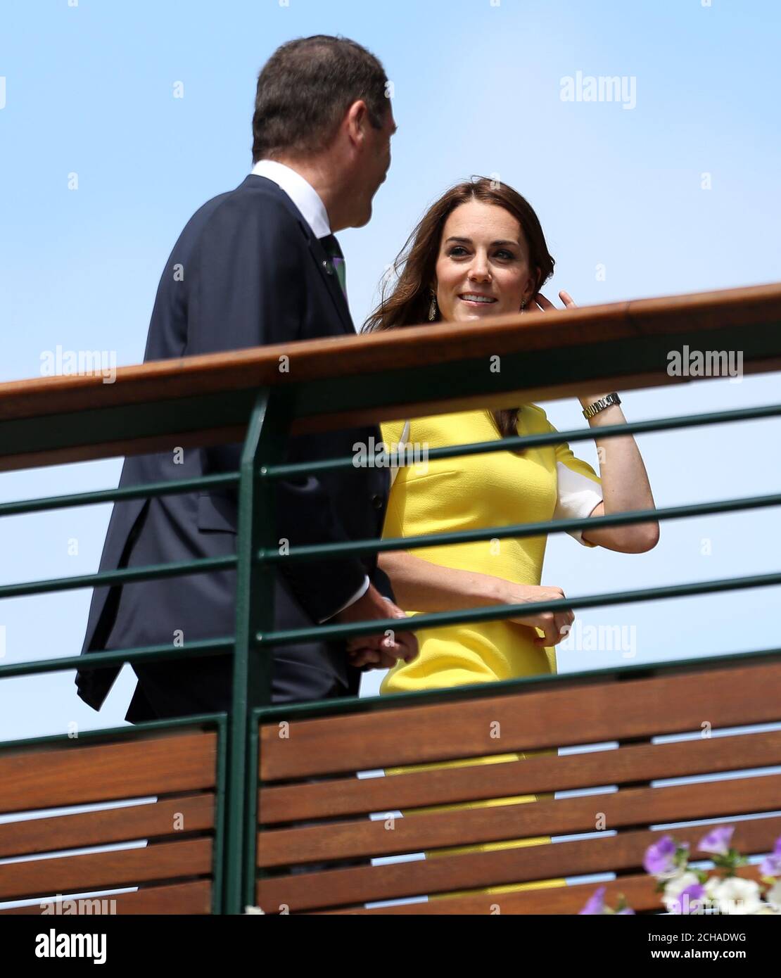 The Duchess of Cambridge and Chairman of the AELTC Philip Brook on day ...