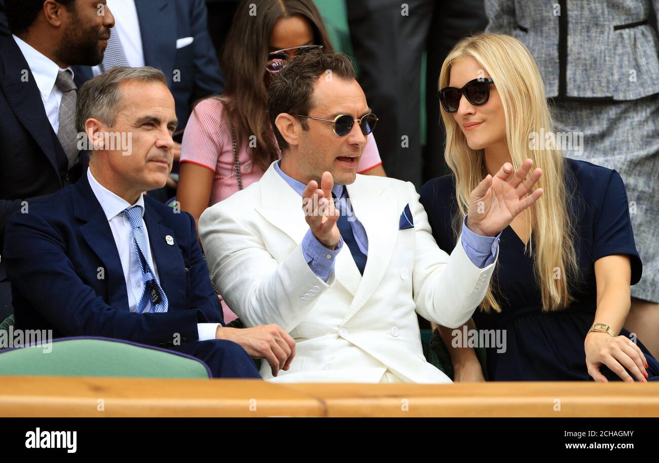Royal Box guests (left-right) Mark Carney, Jude Law and Phillipa Coan ...