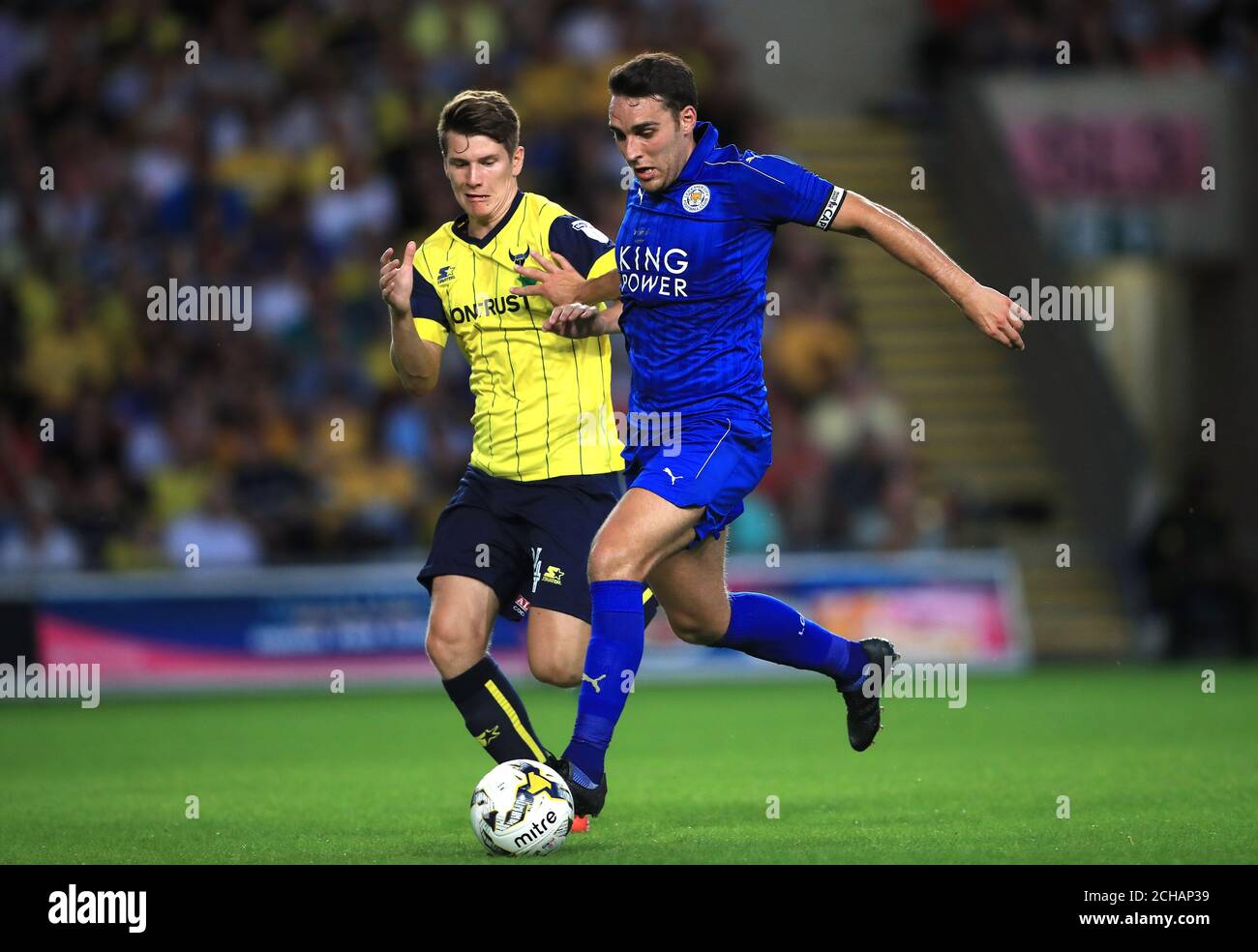 Leicester City's Matty James (right) holds off Oxford United's Josh ...
