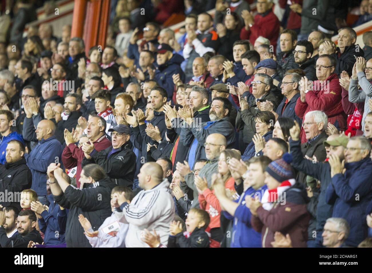 Aberdeen fans in the stands at Pittodrie Stadium Stock Photo - Alamy