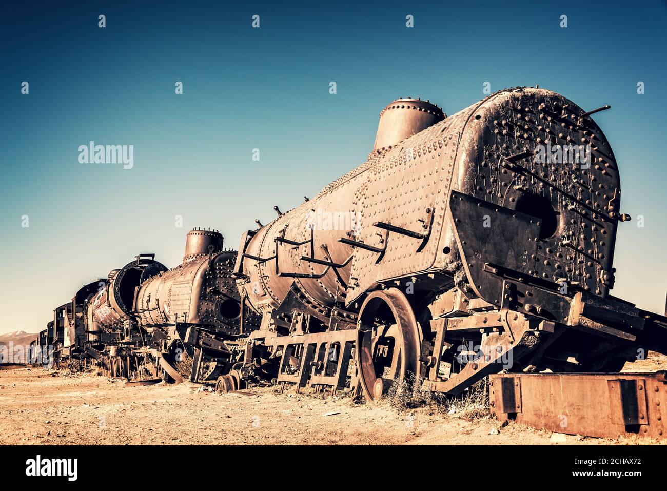 Old rusty locomotive abandoned in the train cemetery of Uyuni, Bolivia ...