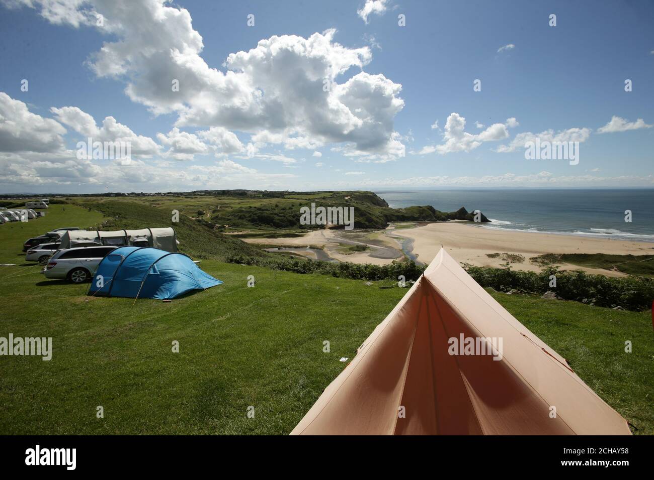 A view of Three Cliffs Bay beach from the Three Cliffs Bay camp site ...