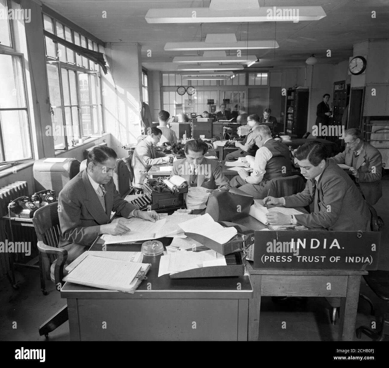 Office workers desk india Black and White Stock Photos & Images - Alamy