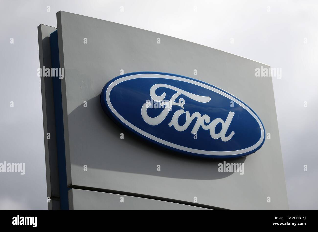 General view of a sign for Ford car dealership in Basingstoke Stock ...