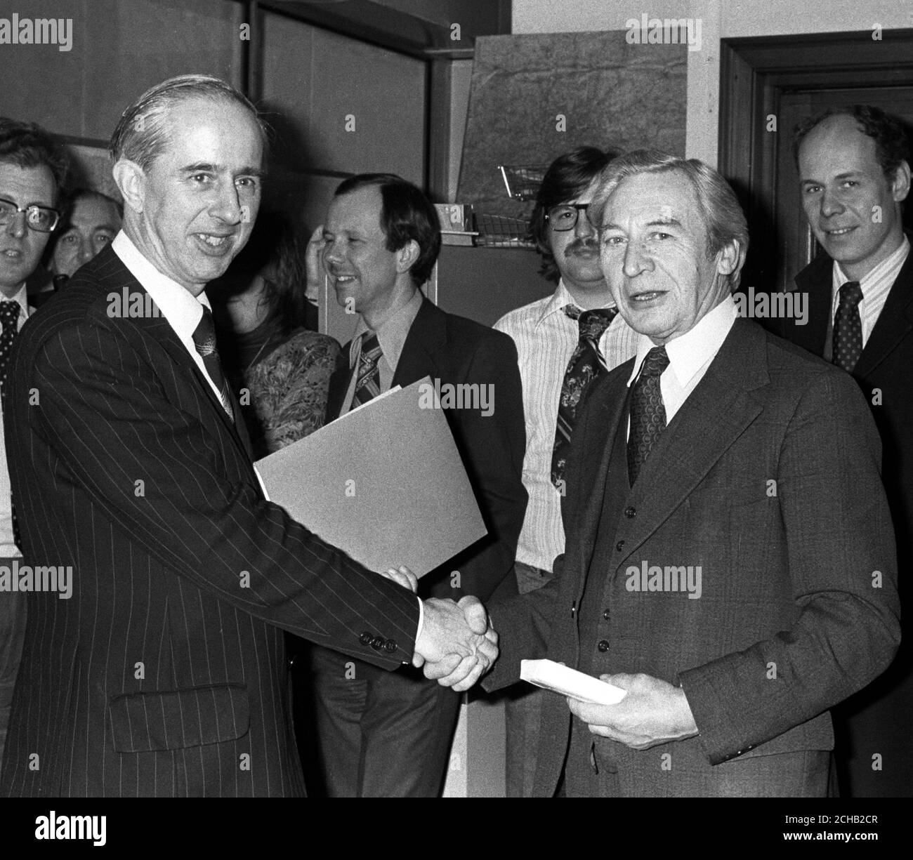 Len Moxon (r), retiring Press Association chief reporter, receives a ...