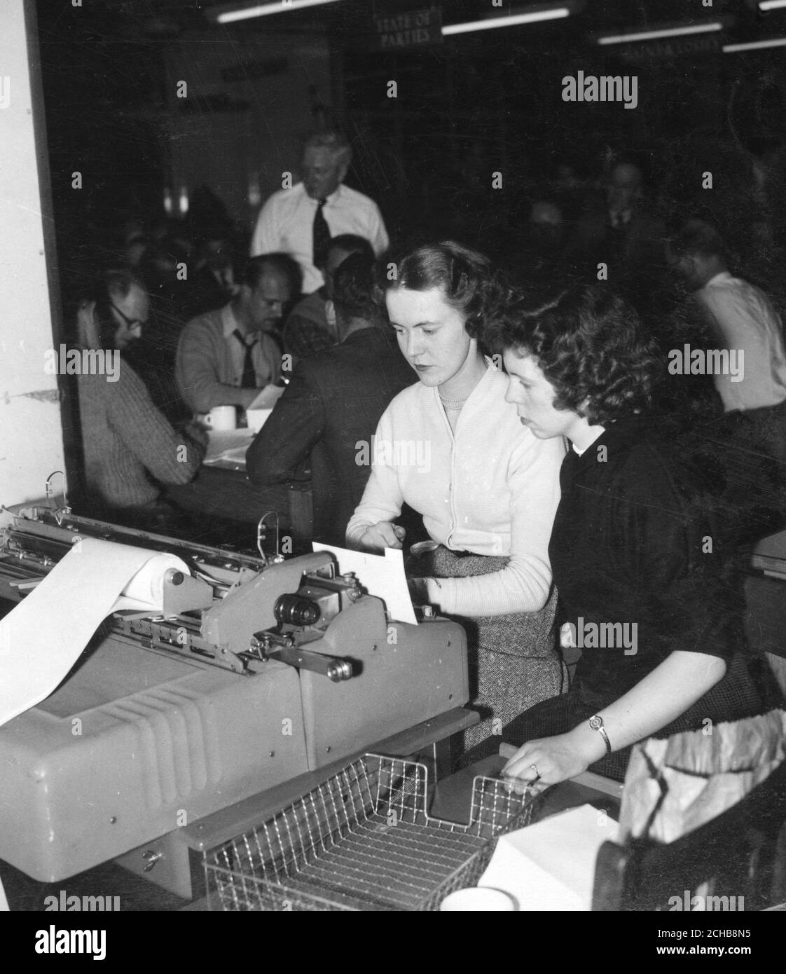 Scenes from the Press Association news room during the 1955 General ...