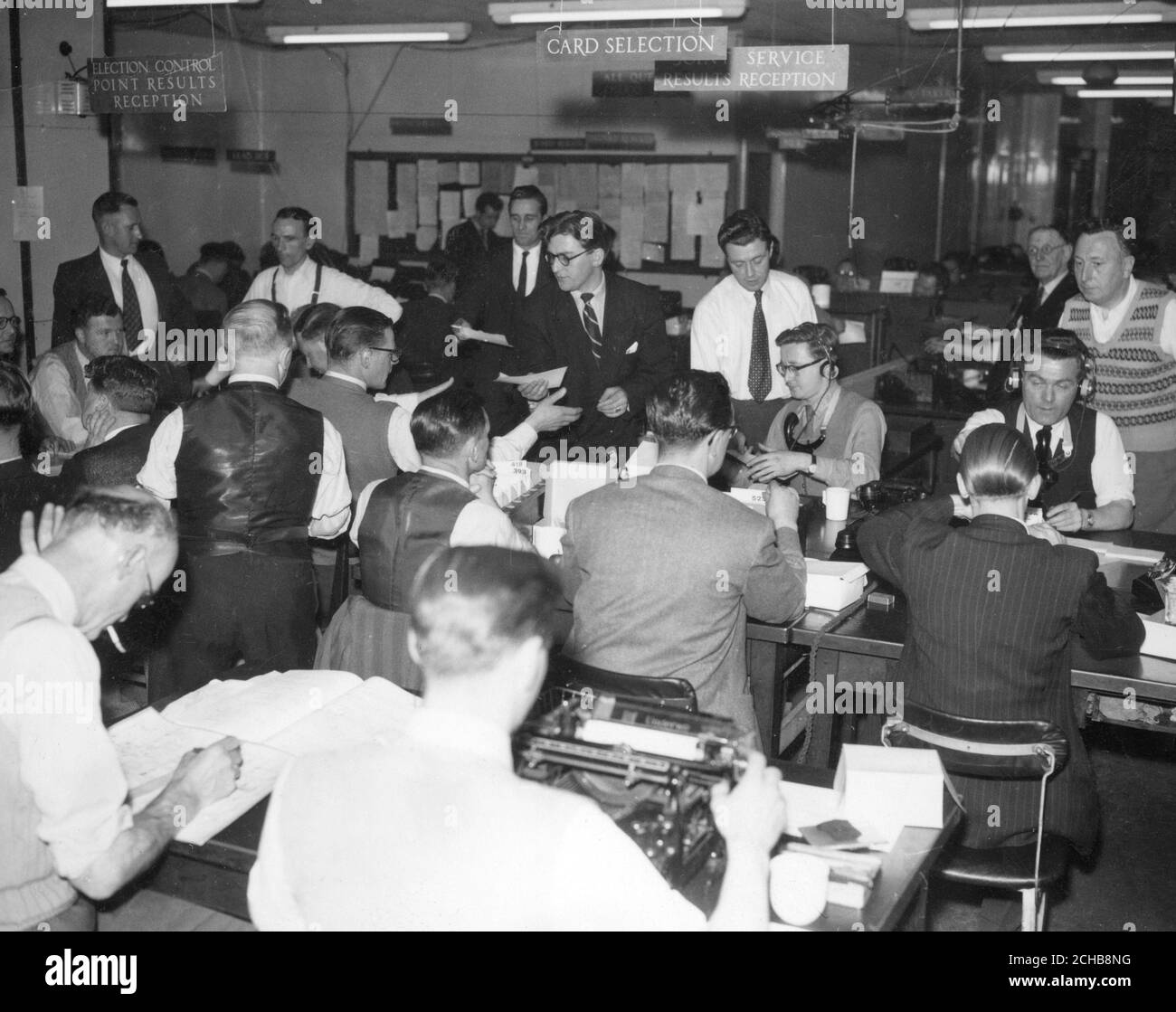 Scenes from the Press Association news room during the 1955 General ...