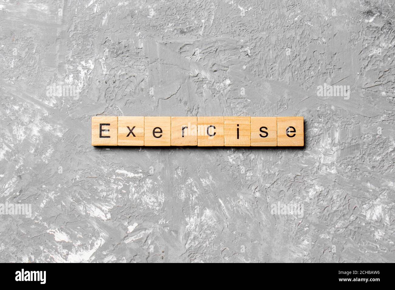 exercise word written on wood block. exercise text on table, concept ...