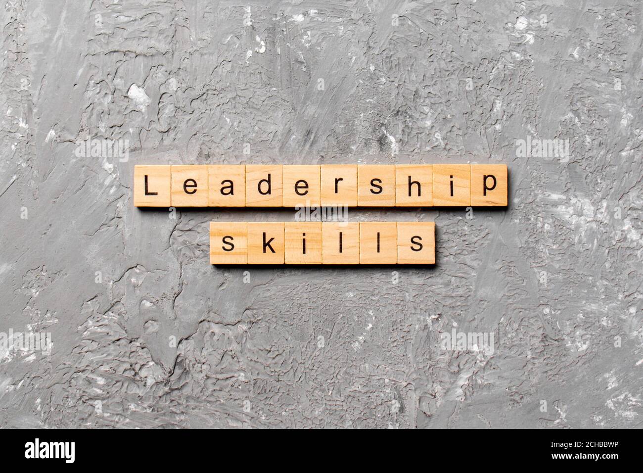 Leadership skills word written on wood block. Leadership skills text on ...