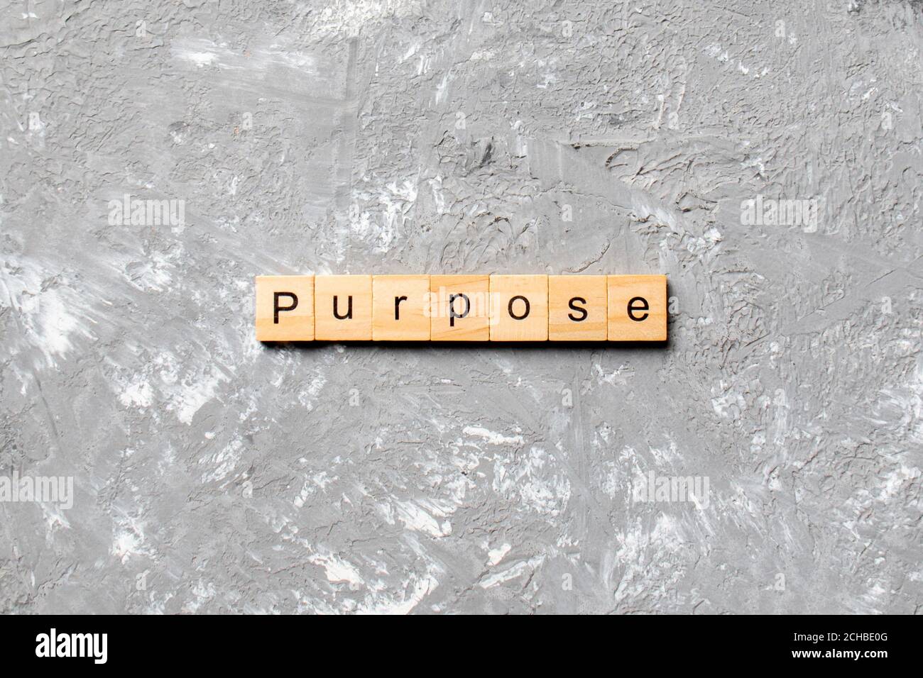 purpose word written on wood block. purpose text on table, concept ...
