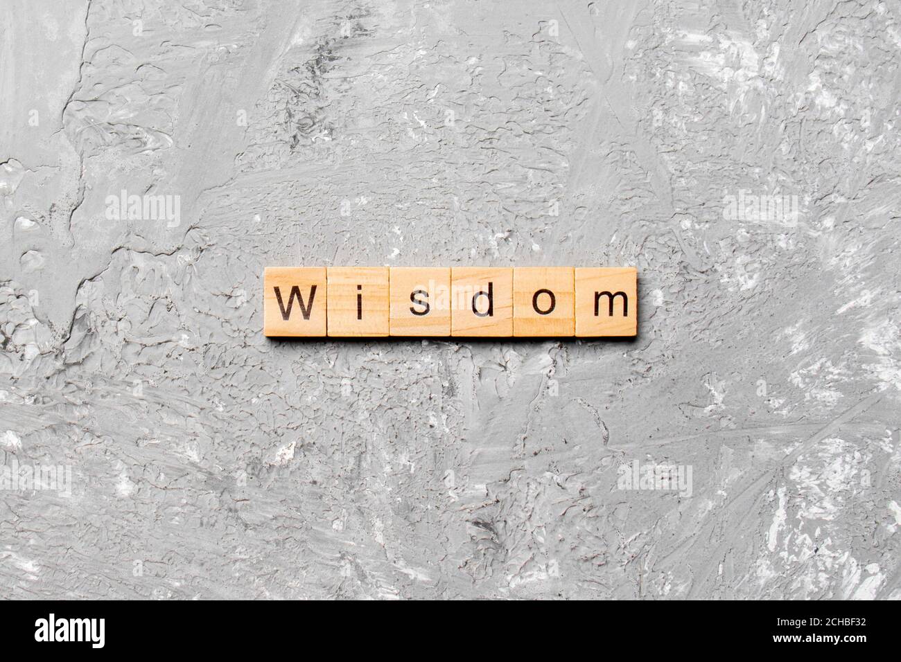 wisdom word written on wood block. wisdom text on table, concept Stock ...