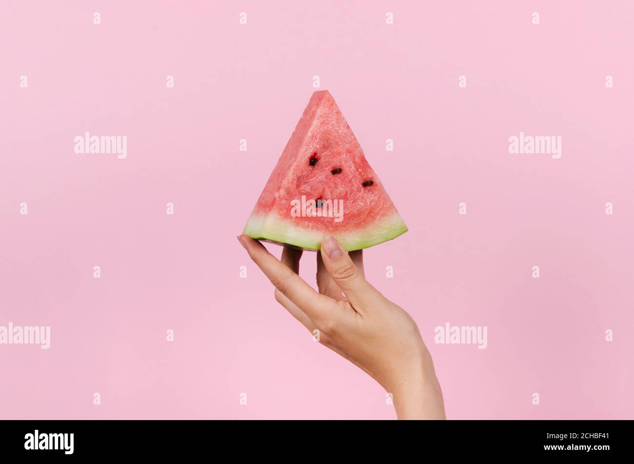 Hand holding melon hi-res stock photography and images - Alamy