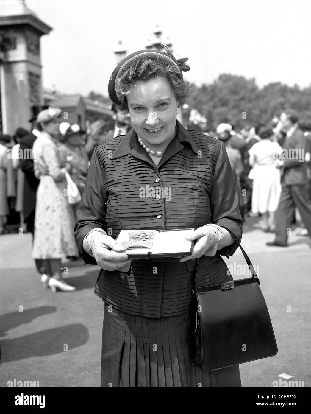 Todays investiture at buckingham palace hi-res stock photography and ...