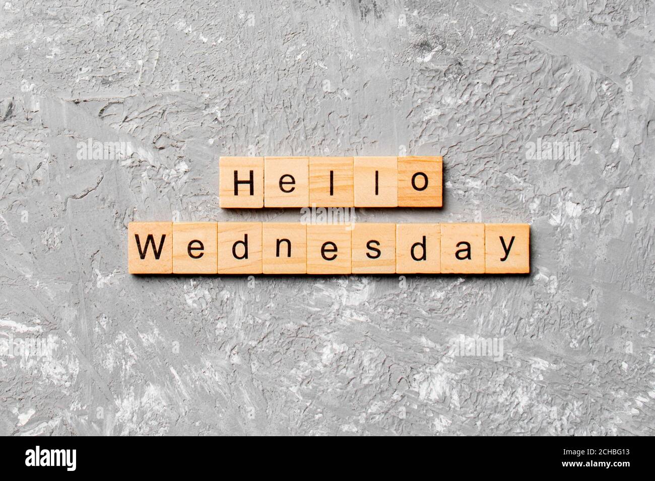 hello wednesday word written on wood block. hello wednesday text on ...