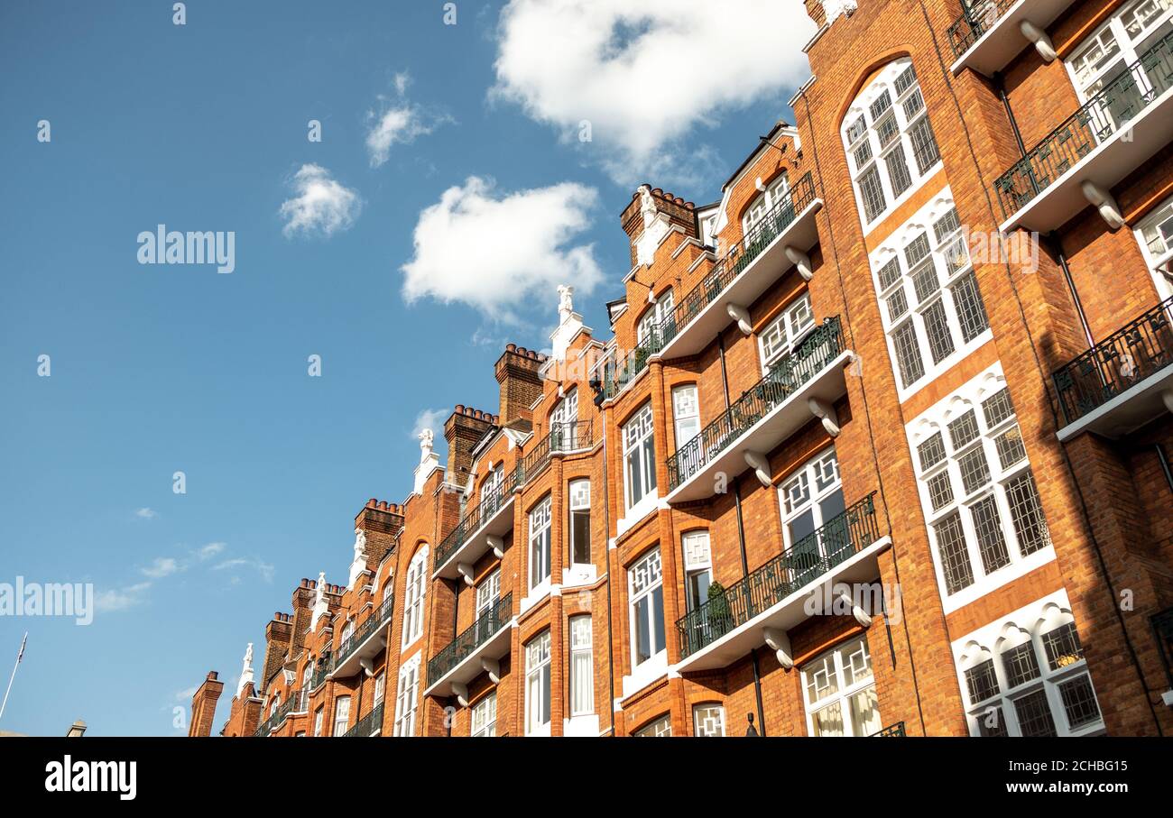 London - Luxury red brick mansion buildings in Marylebone Stock Photo ...