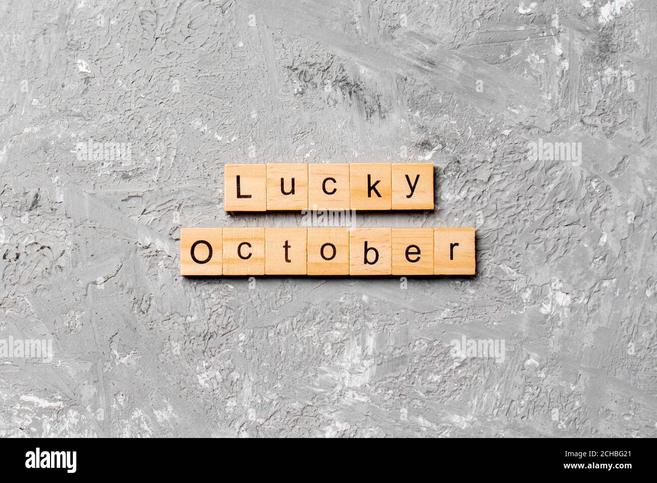 lucky october word written on wood block. lucky october text on table ...