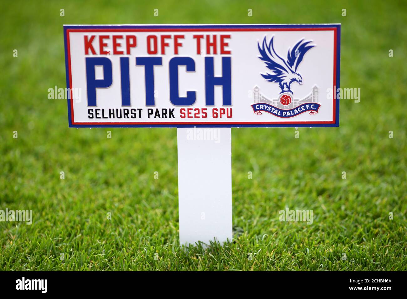 Signage to keep off the pitch at Selhurst Park Stock Photo - Alamy