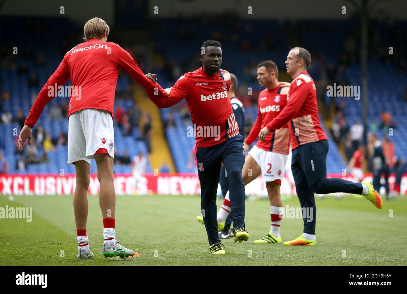 Stoke City players warm up Stock Photo - Alamy
