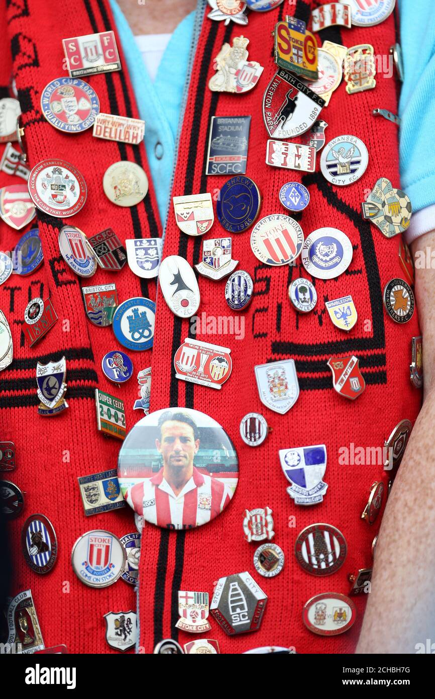 Stoke city fan wearing multiple pin badges hi-res stock photography and ...