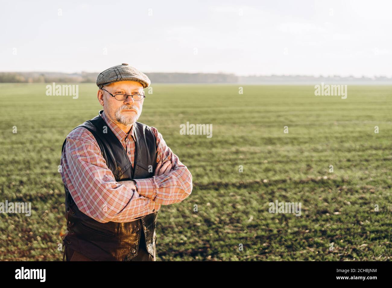 Male farmer walking checking plants hi-res stock photography and images ...