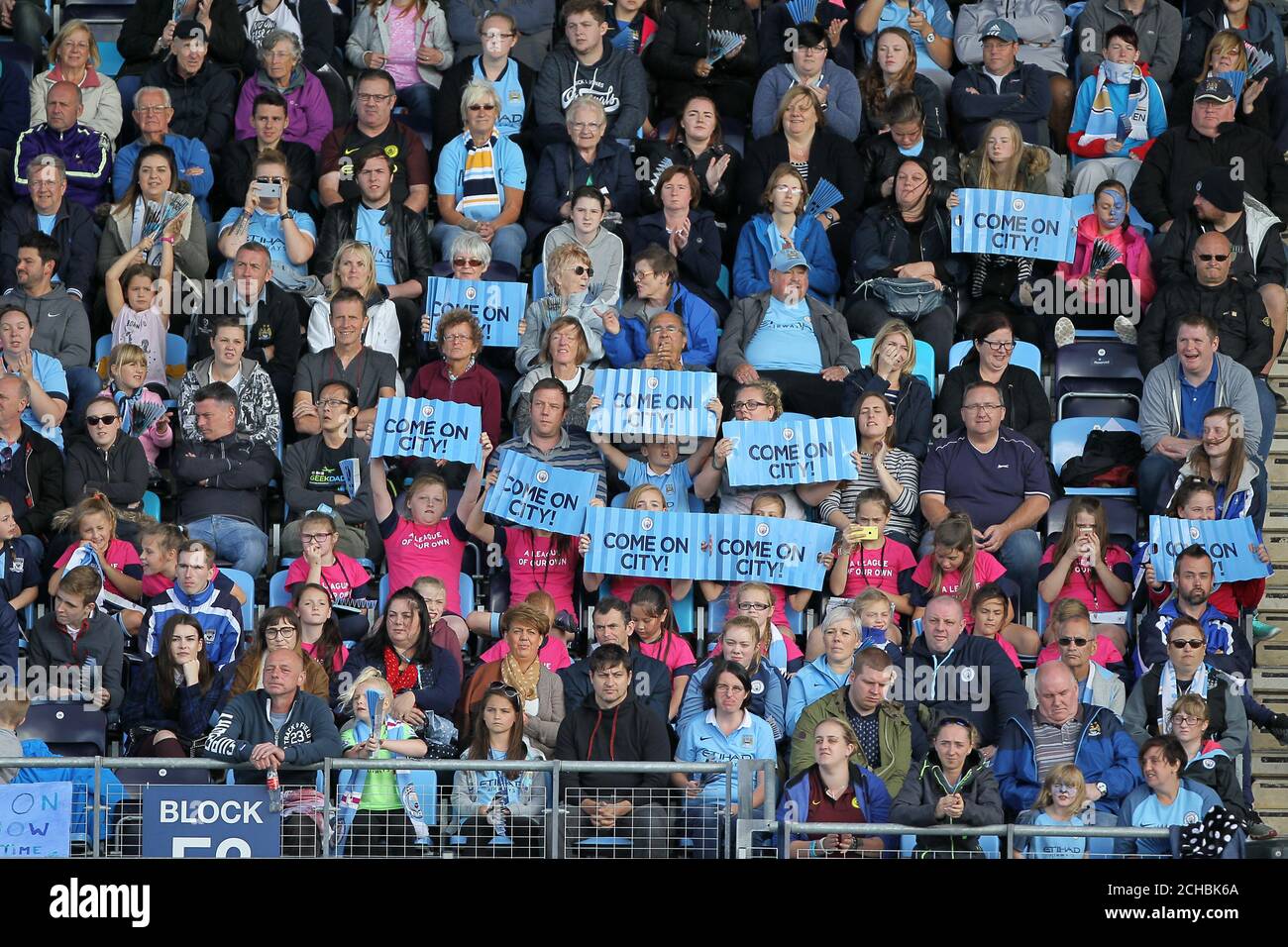 Manchester city supporters in the crowd hi-res stock photography and ...