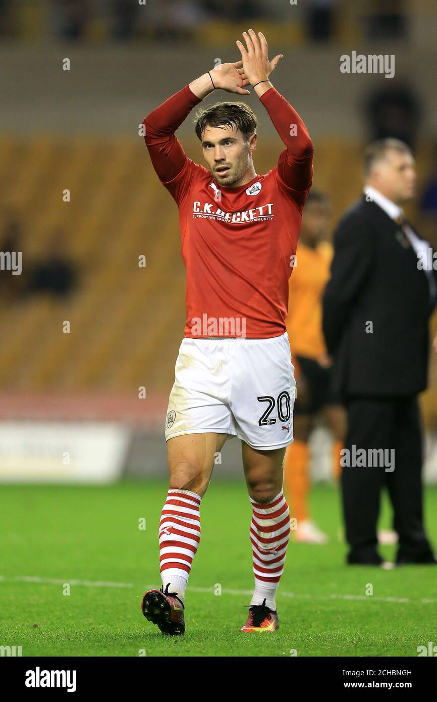 Barnsley's Tom Bradshaw applauds the travelling support Stock Photo - Alamy