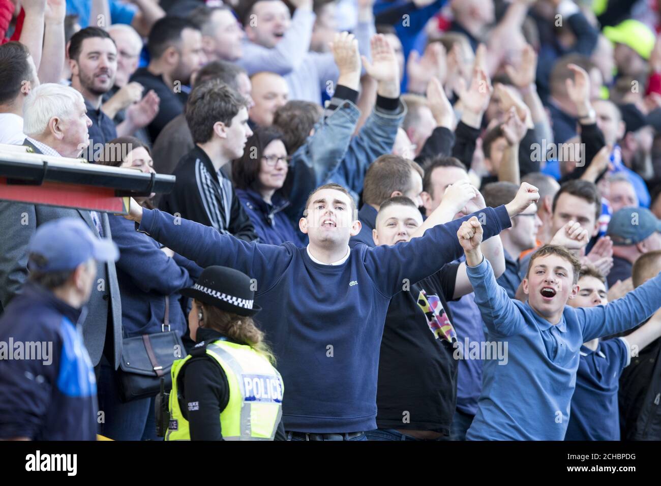 Rangers fans in the stands at Pittodrie Stadium Stock Photo - Alamy