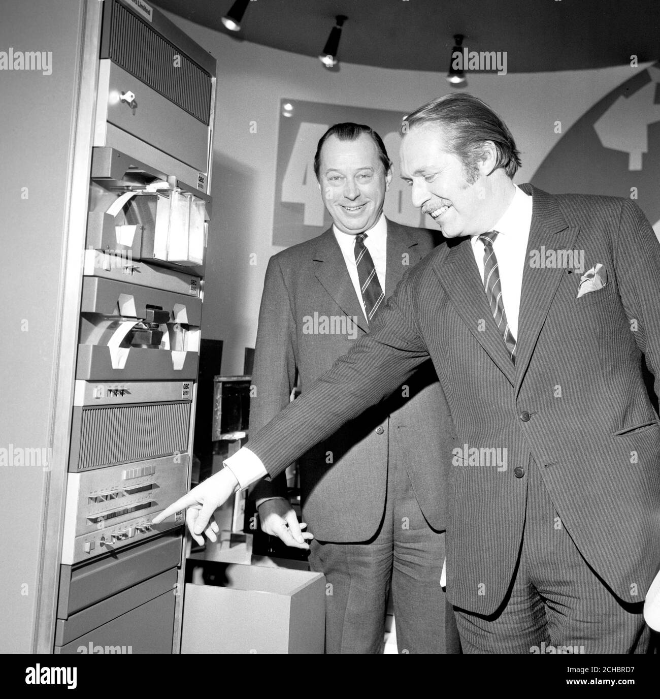 Anthony Grant presses a button to start the latest GEC 2050 computer to ...