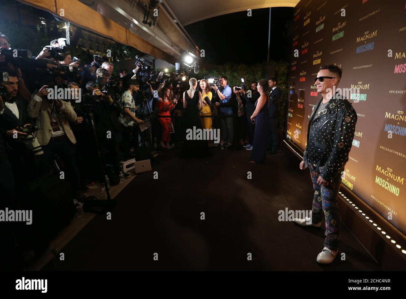 EDITORIAL USE ONLY Jeremy Scott, Moschino Creative Director, arrives at ...