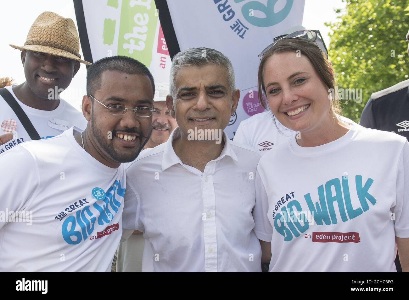 EDITORIAL USE ONLY London Mayor Sadiq Khan (centre) speaks to walkers ...