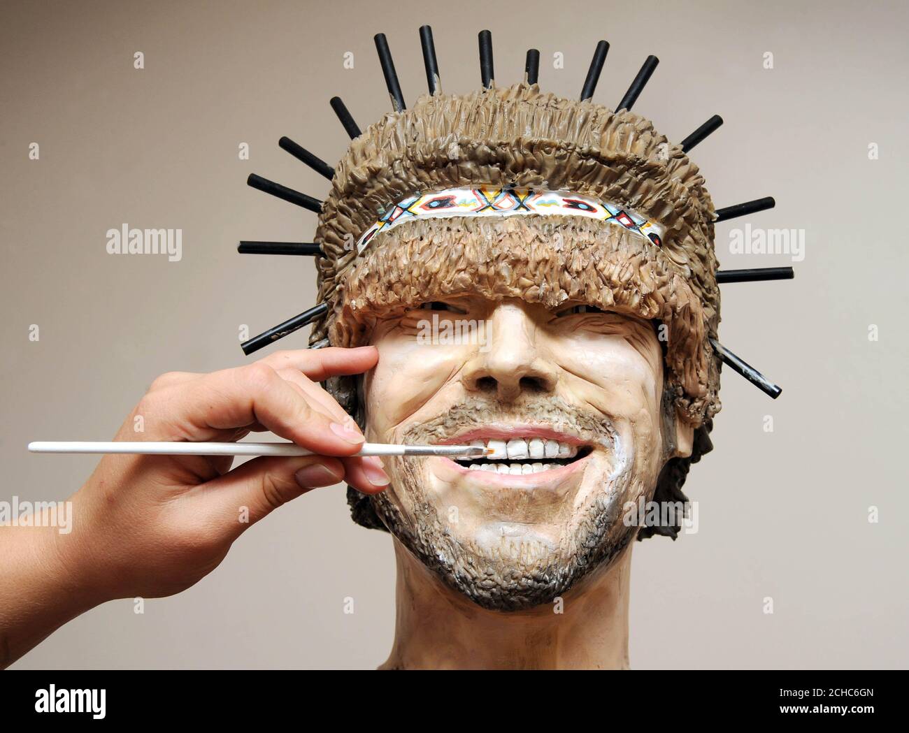 EDITORIAL USE ONLY Food artist Lara Mason puts the finishing touches to ...