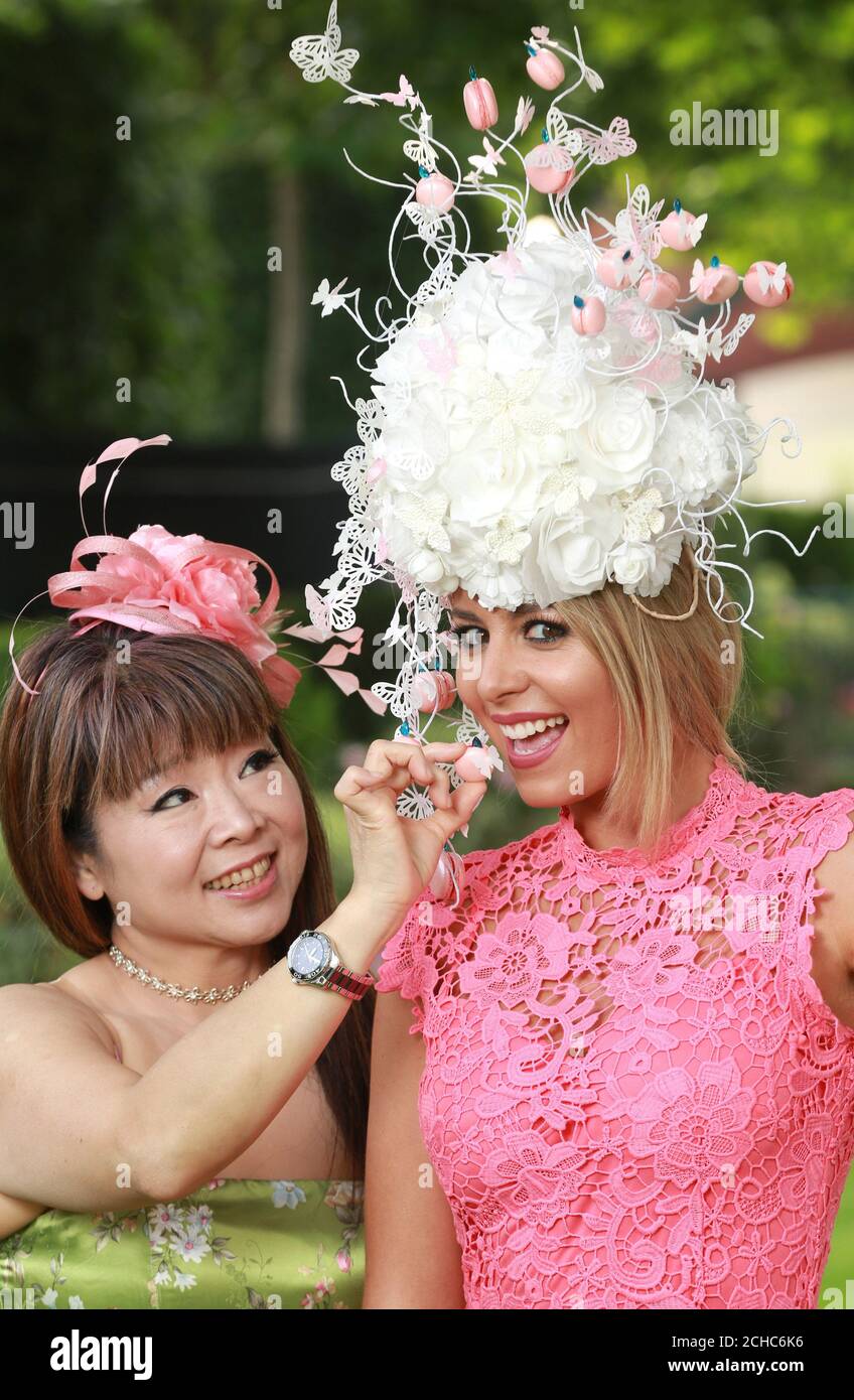 Model Carly Baker wears an edible hat commissioned by bookmakers Coral ...