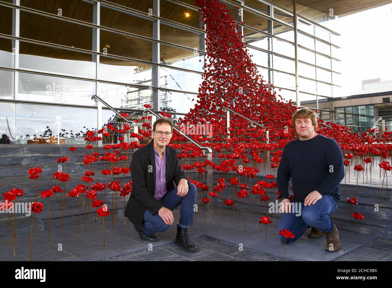 EDITORIAL USE ONLY Designer Tom Piper (left) and artist Paul Cummins ...