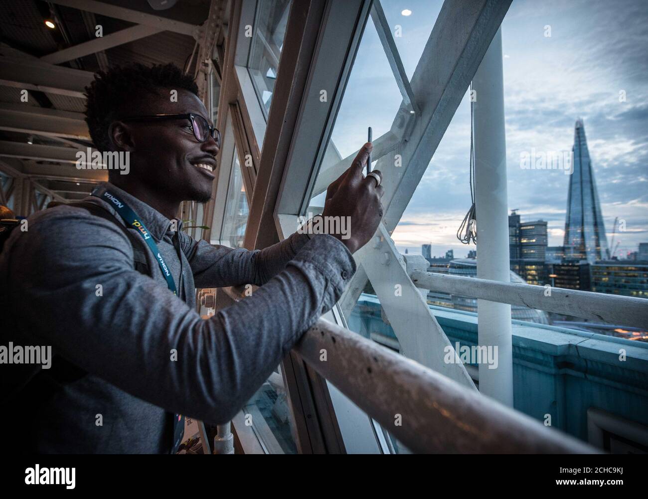 EDITORIAL USE ONLY A guest tries the new Nokia 8 at the launch event ...