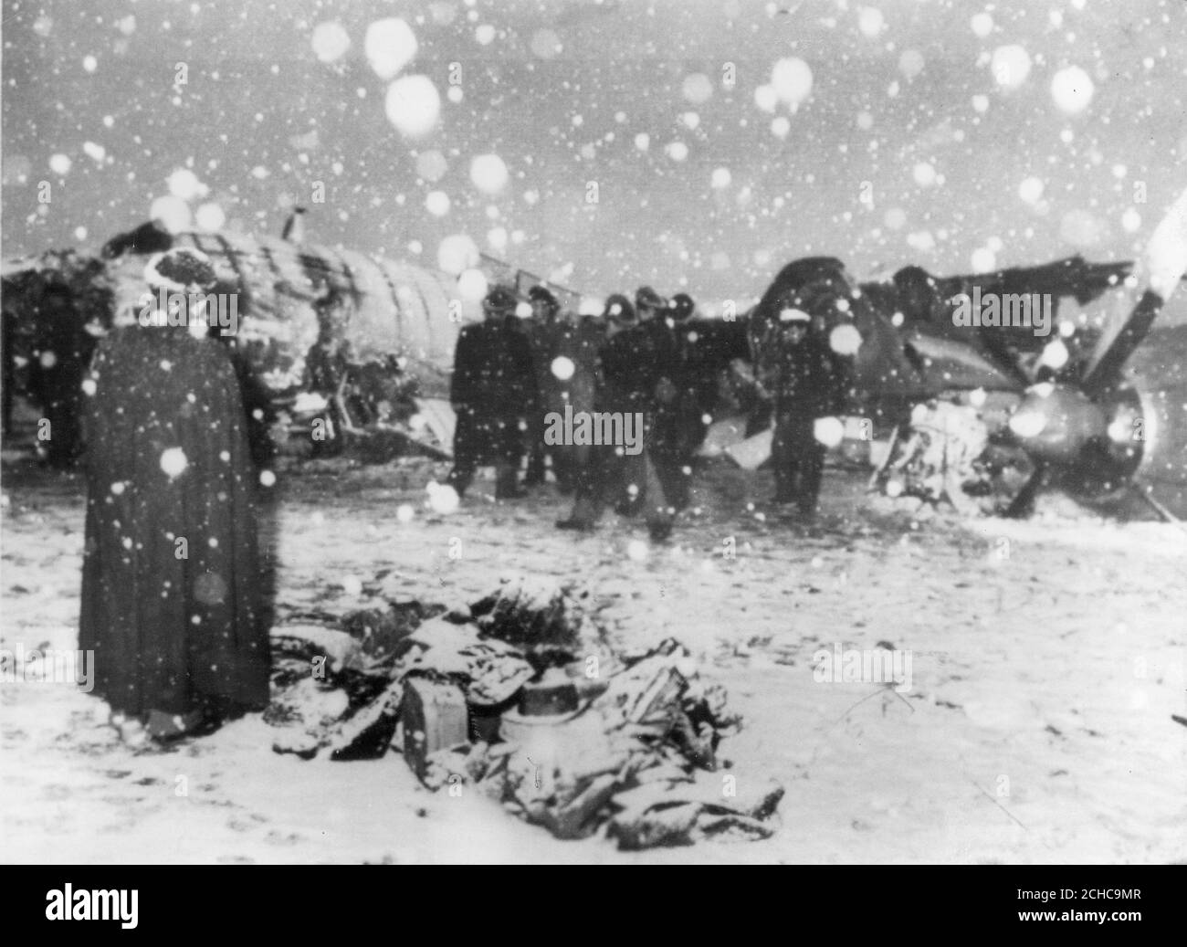 Rescuers and officials search round the wreckage of the BEA Elizabethen ...