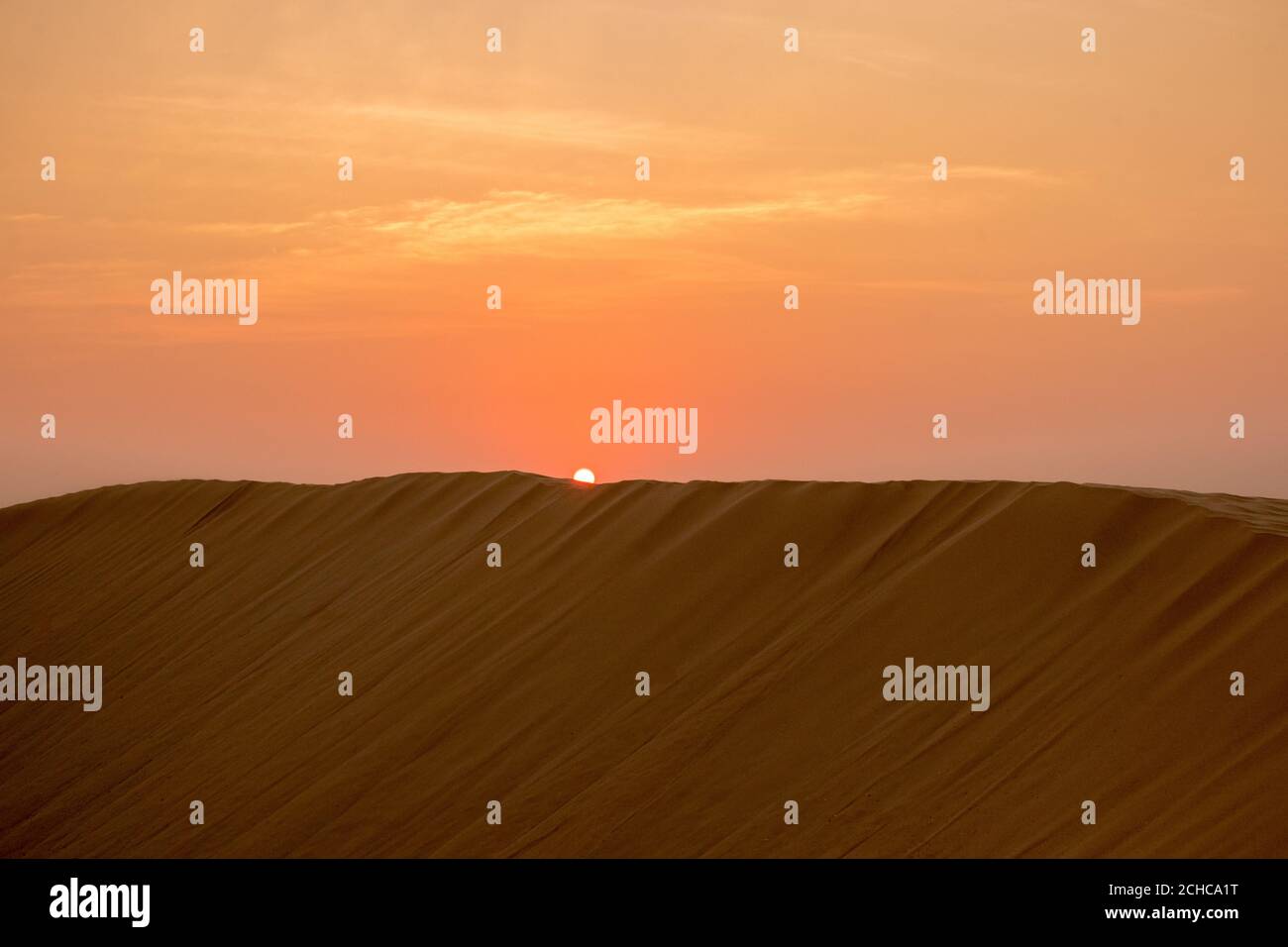 View of windy sand dunes deep in desert of Abu Dhabi - United Arab ...