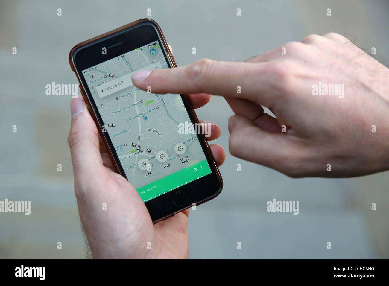 Uber on phone hi-res stock photography and images - Alamy