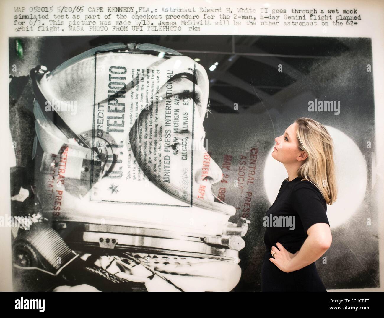 EDITORIAL USE ONLY Gallery staff Anna Jones, looks at 'press++01.16' by ...
