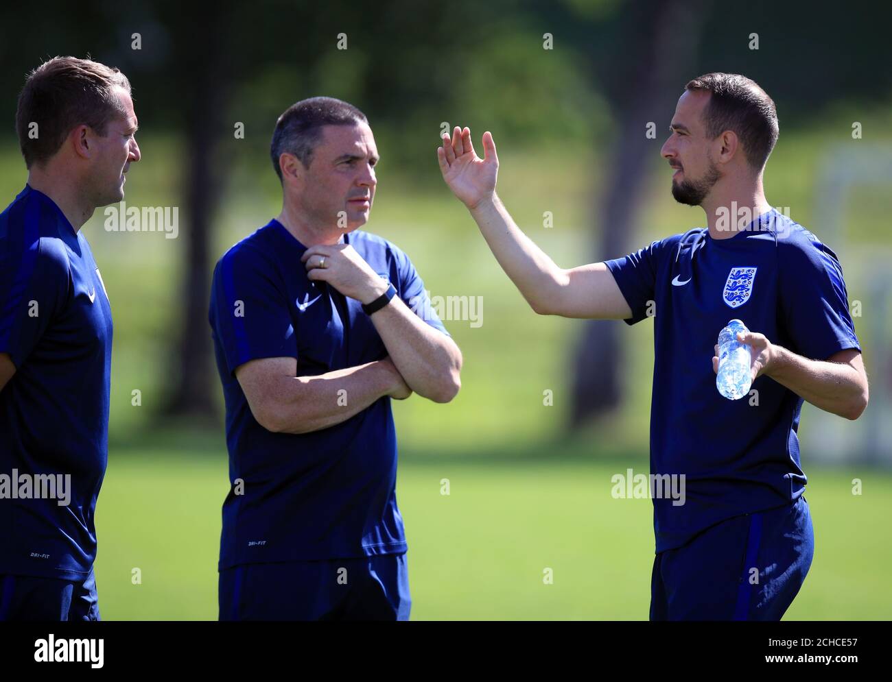 England manager Mark Sampson (right) with coaches including goalkeeping ...