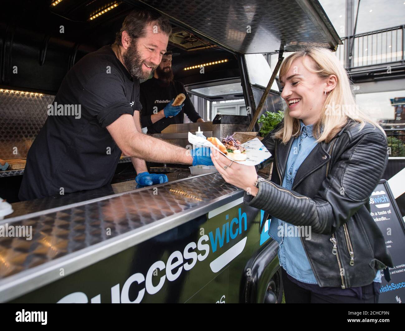 EDITORIAL USE ONLY Olivia Tadman tries a 'Successwich', which is a ...