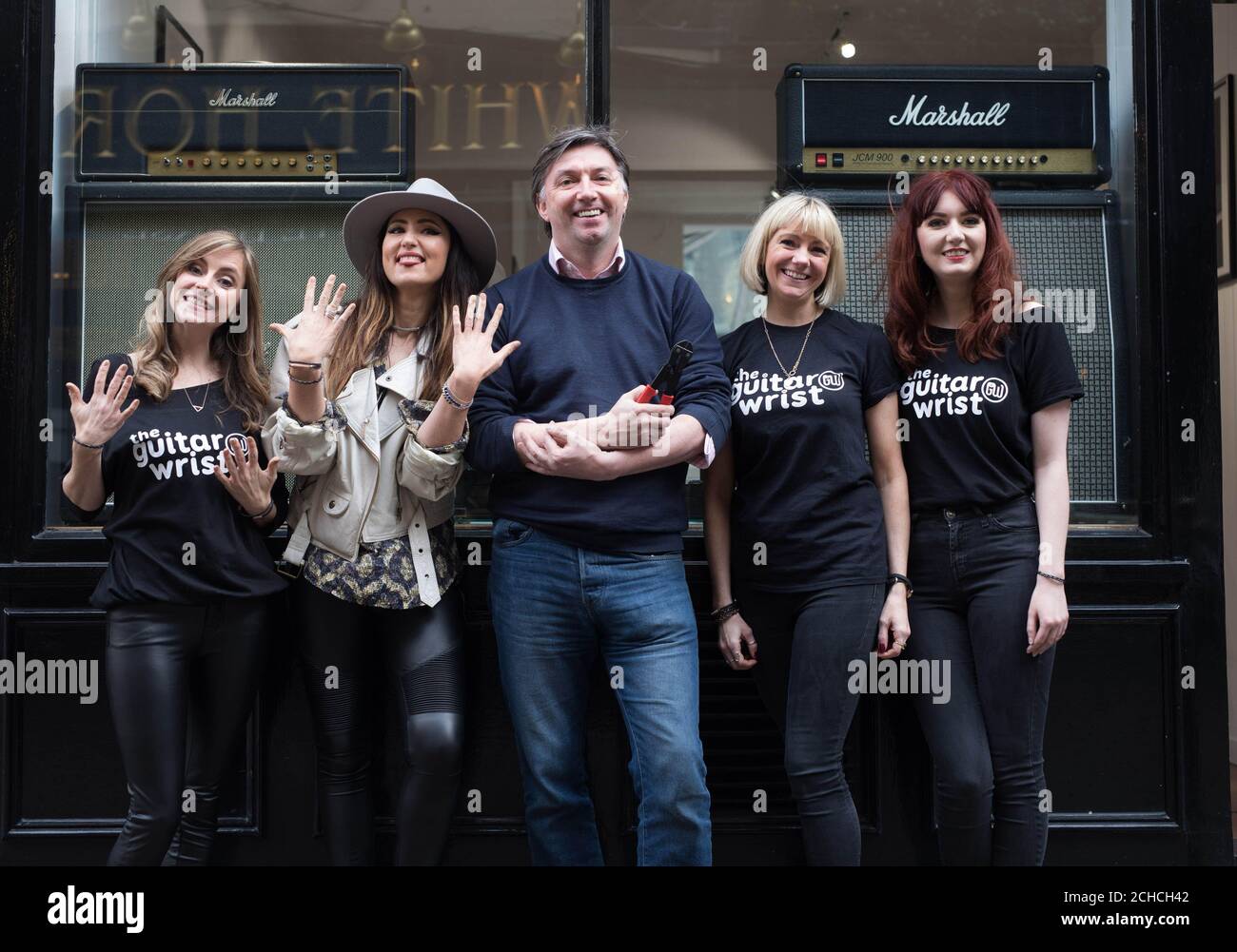 KT Tunstall, 2nd left, and Ian Rendall, guitarwrist founder, with ...