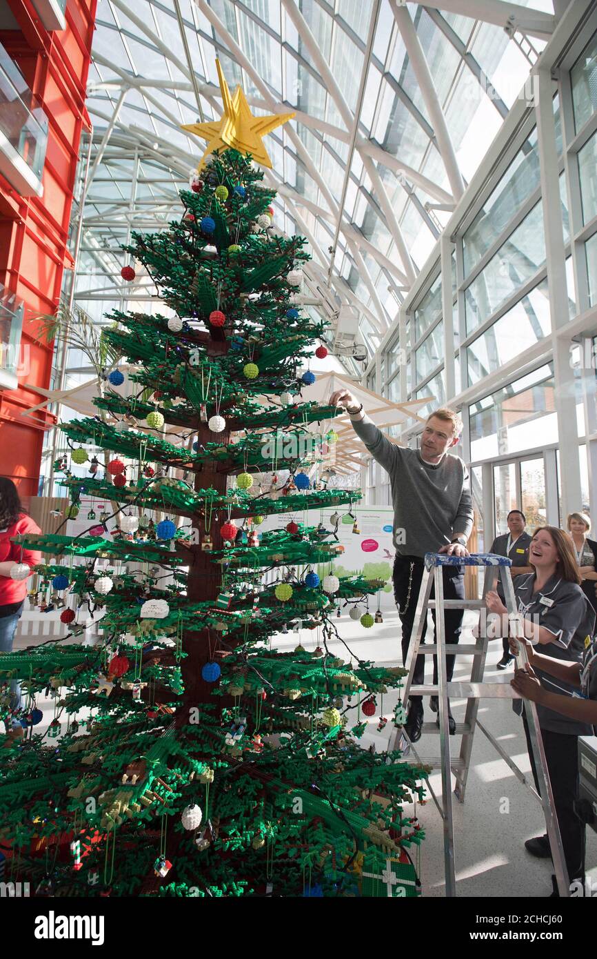 Ronan Keating puts the finishing touches to a LEGO Christmas Tree built ...