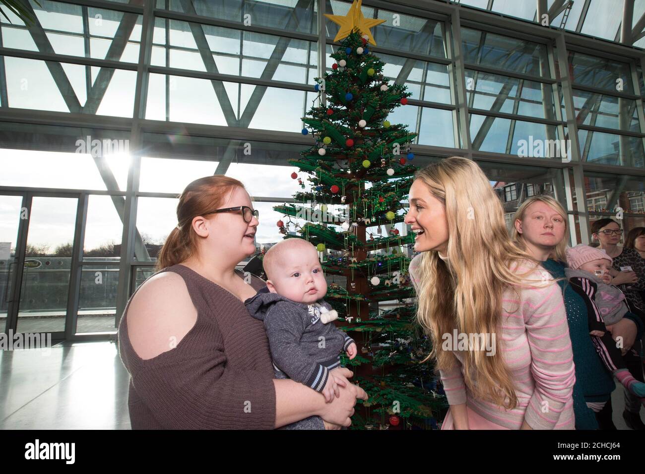 EDITORIAL USE ONLY Storm Keating meets Thomas King, 11 months, and mum ...