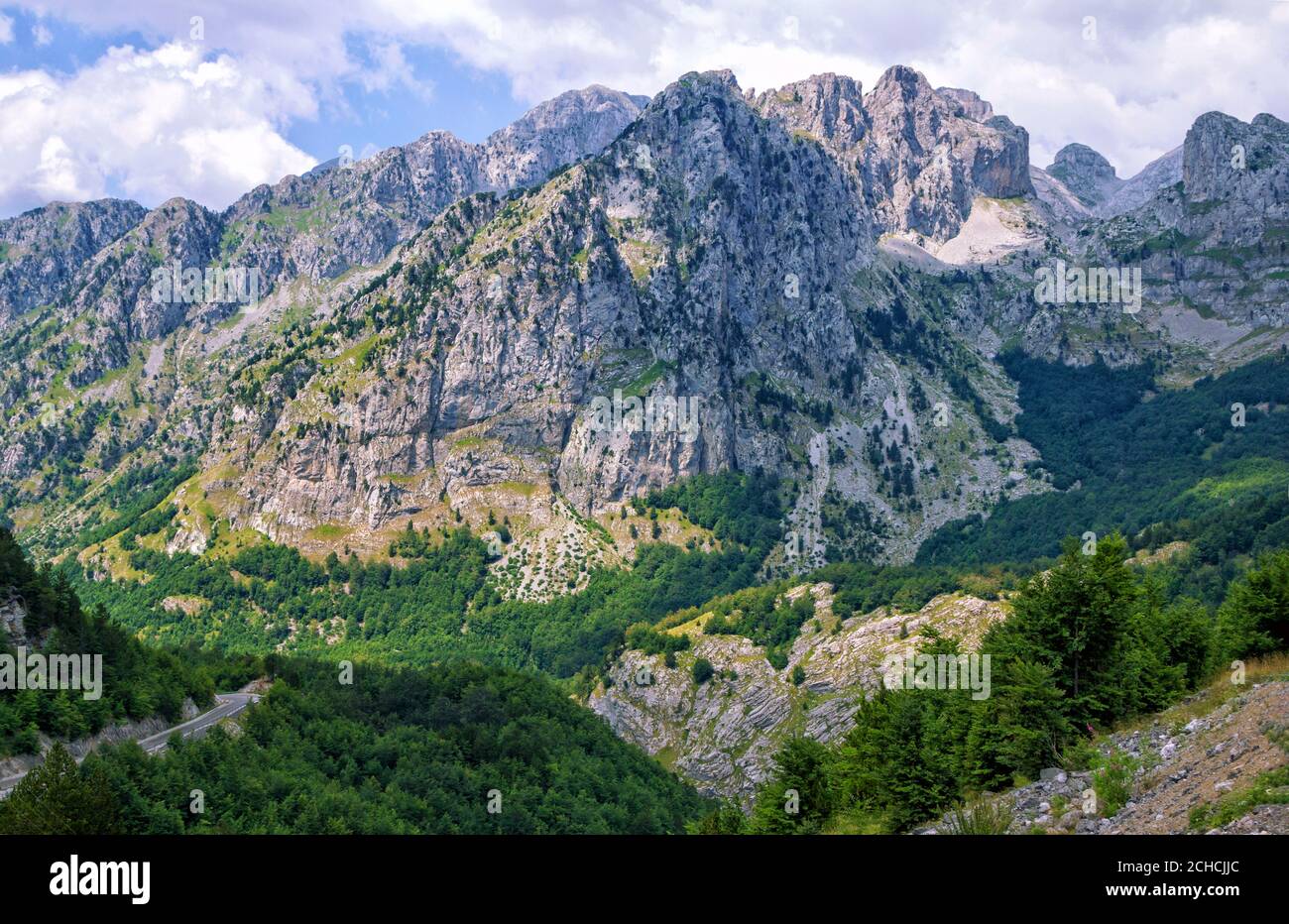 Summer landscape –Albanian mountains, covered with green trees, clouds ...