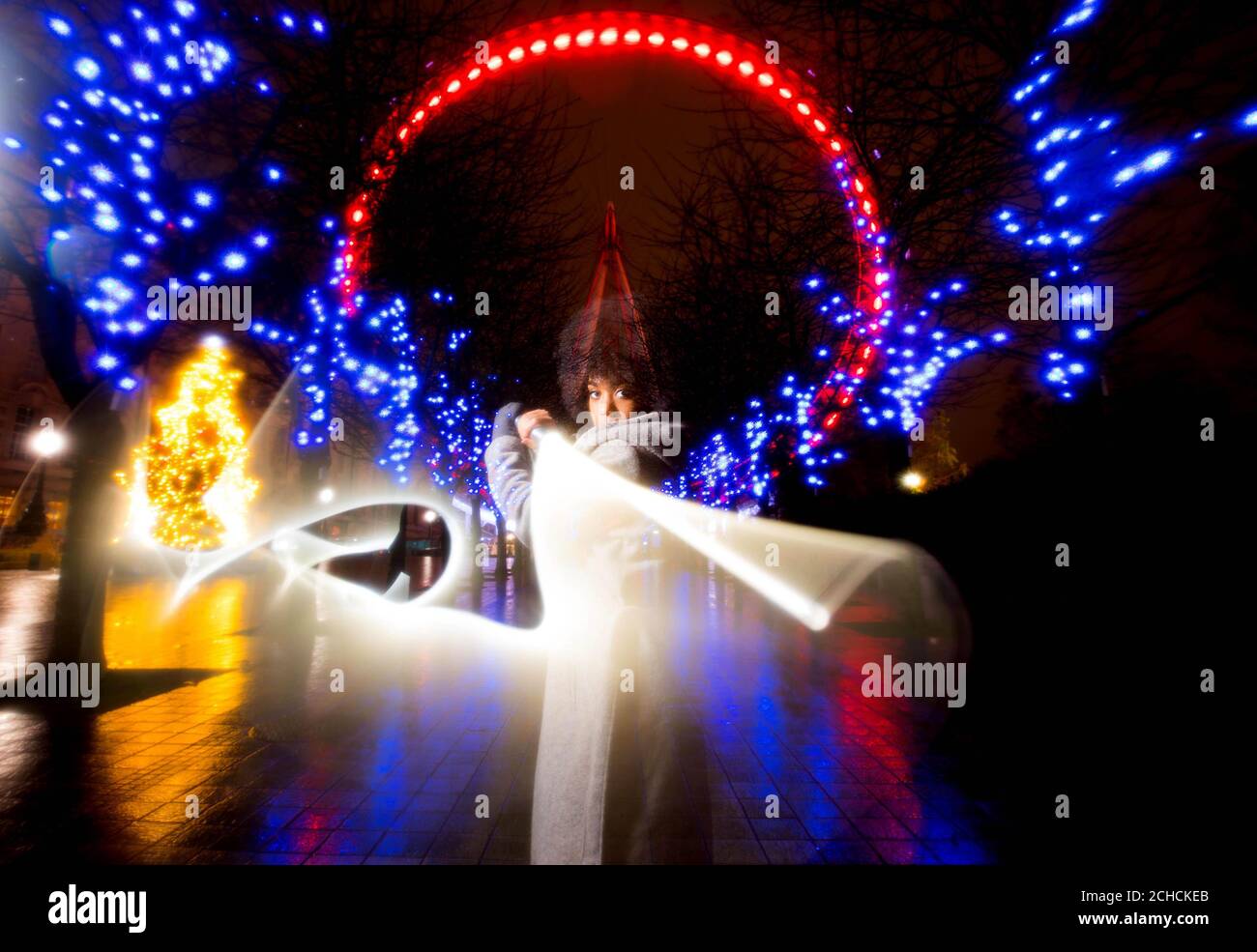 Shania West, a trained stunt fighter, holds a Lightsaber on London's ...