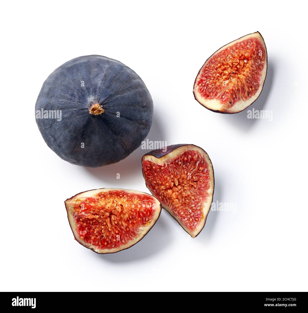 Fig fruit isolated on white background. Top view of fig slices Stock ...